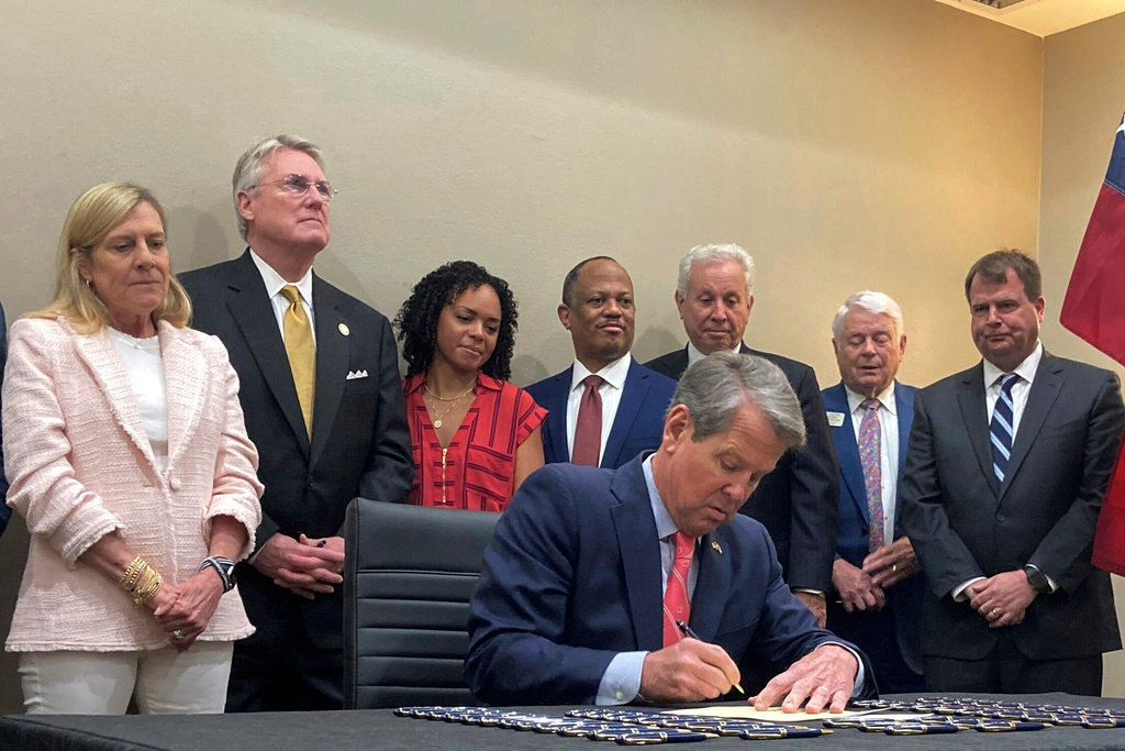 Kemp signs bills aiming to improve school safety, literacy - The ...