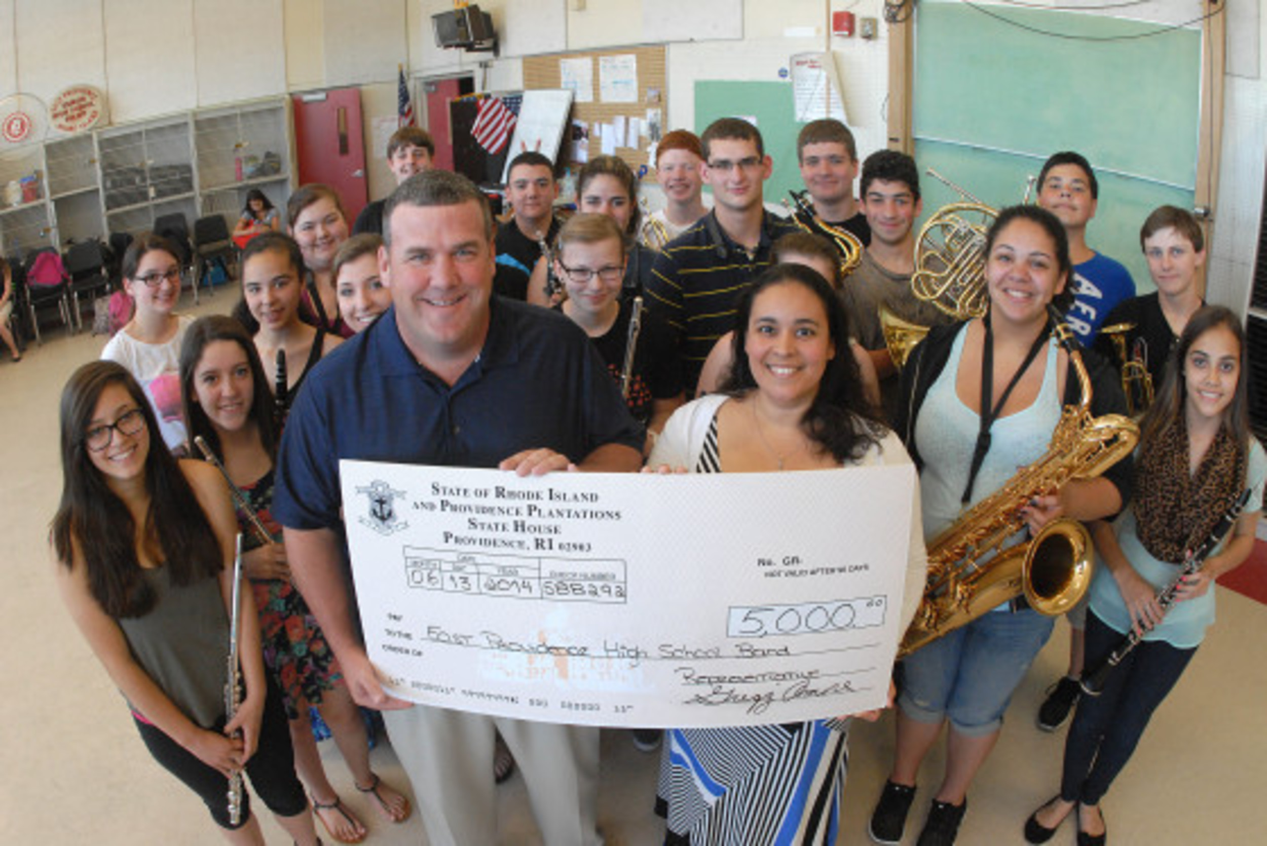 Amore presents East Providence High School band with legislative grant ...