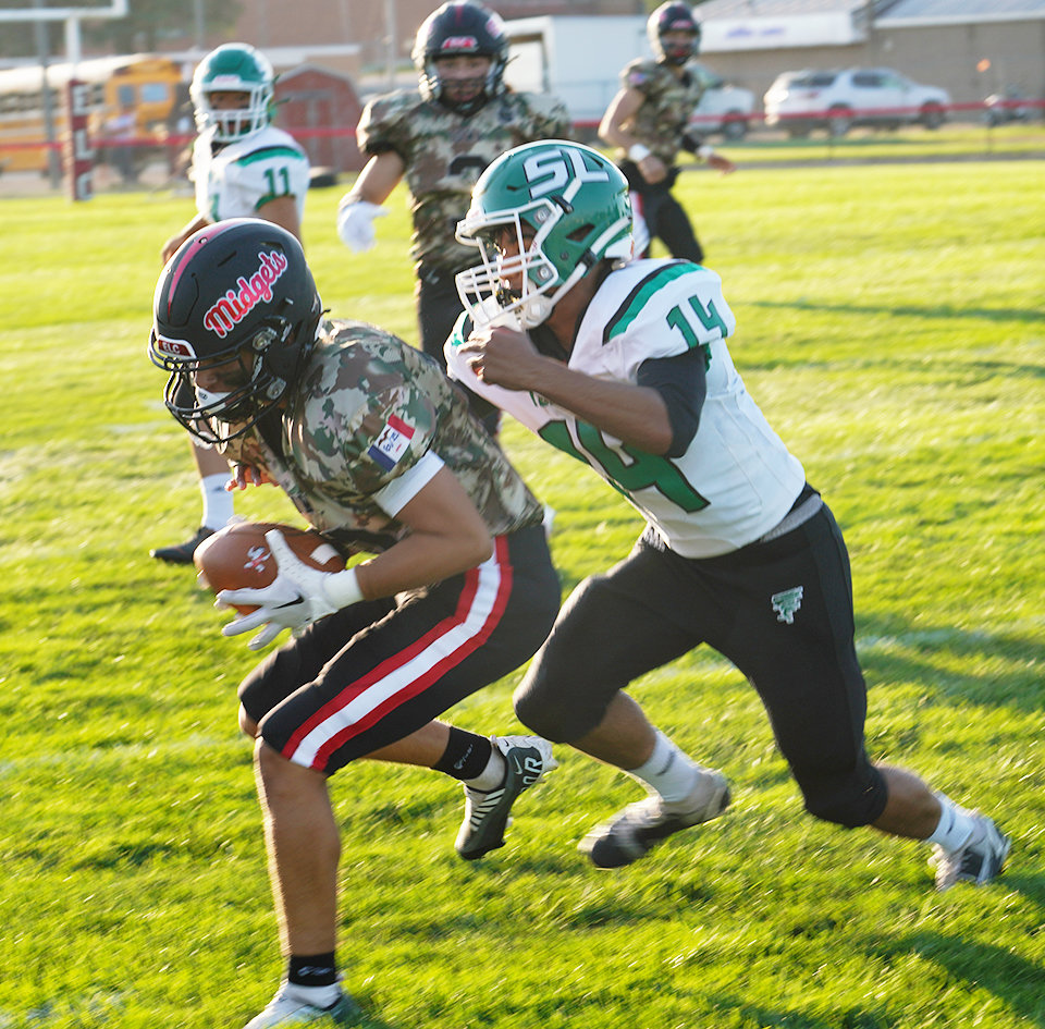 MIDGET MUSCLE - Estherville News
