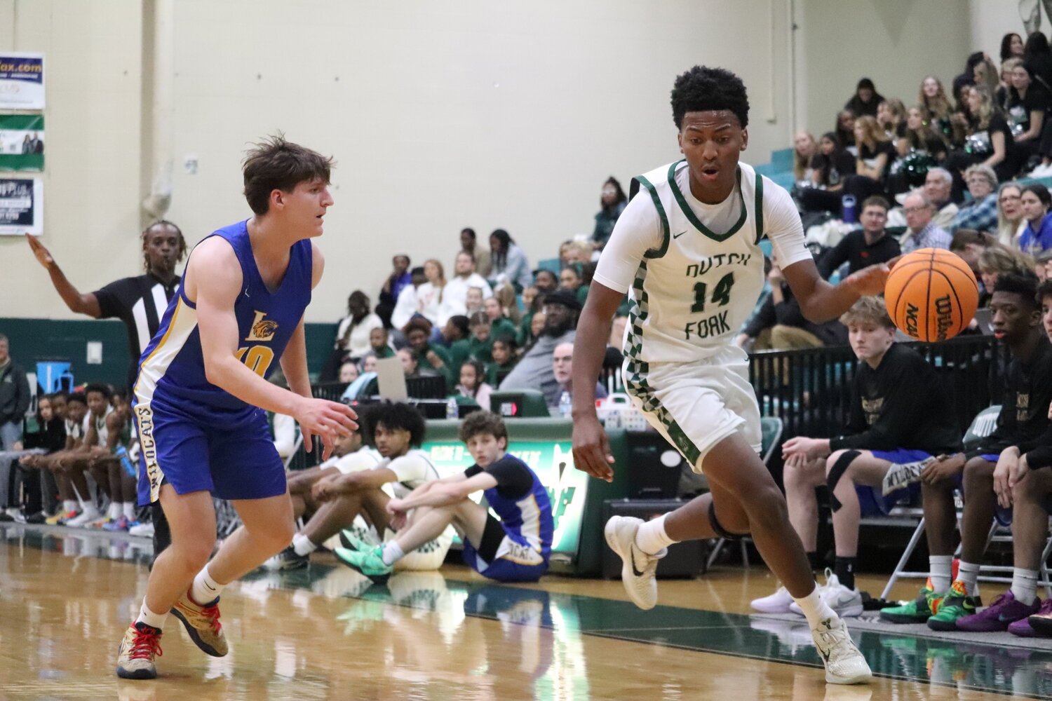 Final unbeaten team falls as boys basketball continues in Lexington ...