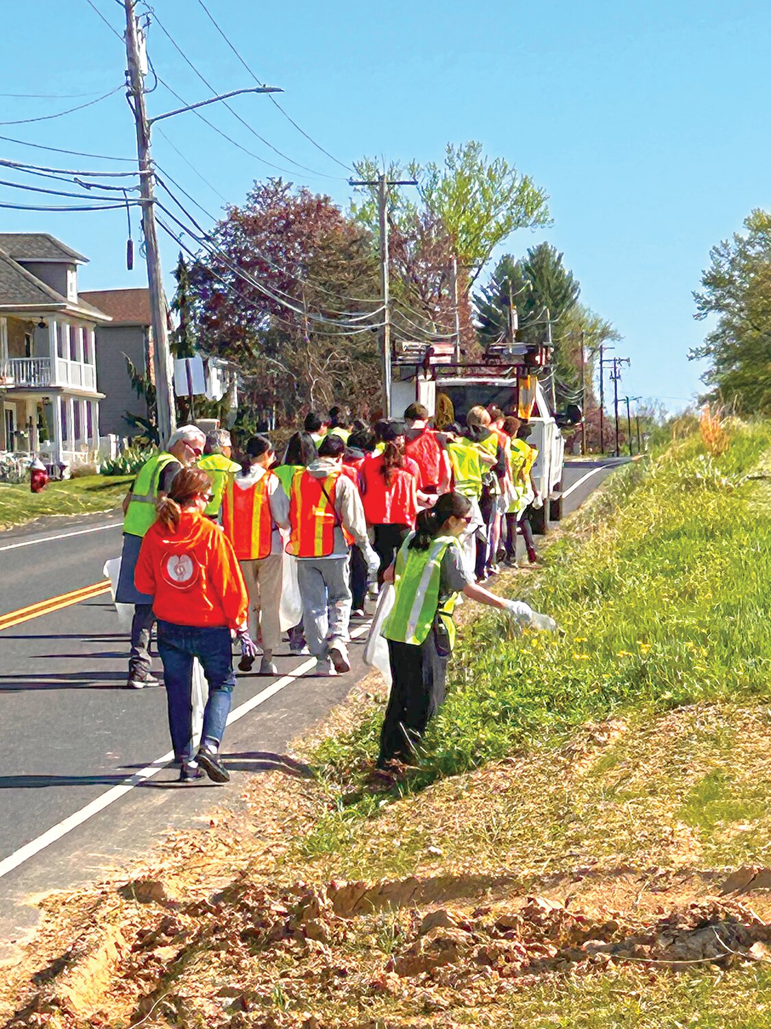 Volunteers help clean up Old Lincoln Highway during annual community ...